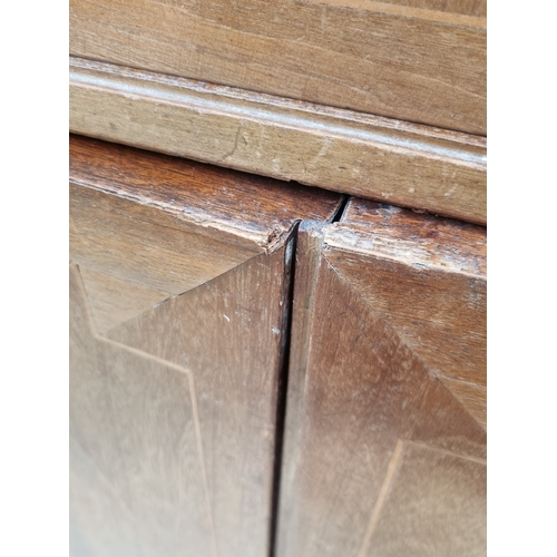 An Edwardian satinwood inlaid Miliner's Cabinet fitted four fall front ...