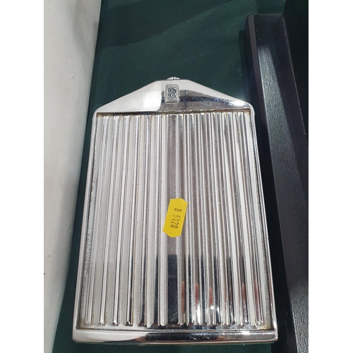 An old black Telephone, a chrome model of an Aeroplane on stand, a ...