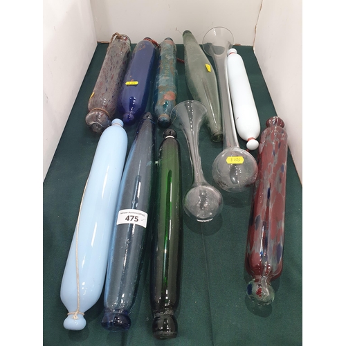 A selection of coloured glass Rolling Pins, some with gilded decoration ...