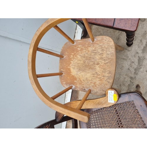 A mahogany Hall Chair with carved and scrolled shield shaped back ...