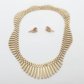 A 1950's 9ct gold graduated Collarette, 41.5cms long, together with a ...