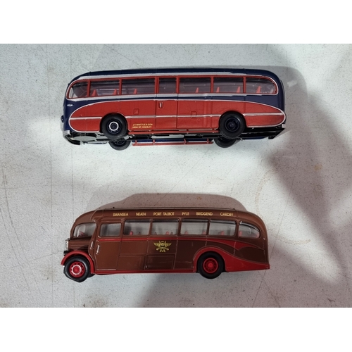 Ten unboxed Corgi Buses and Coaches