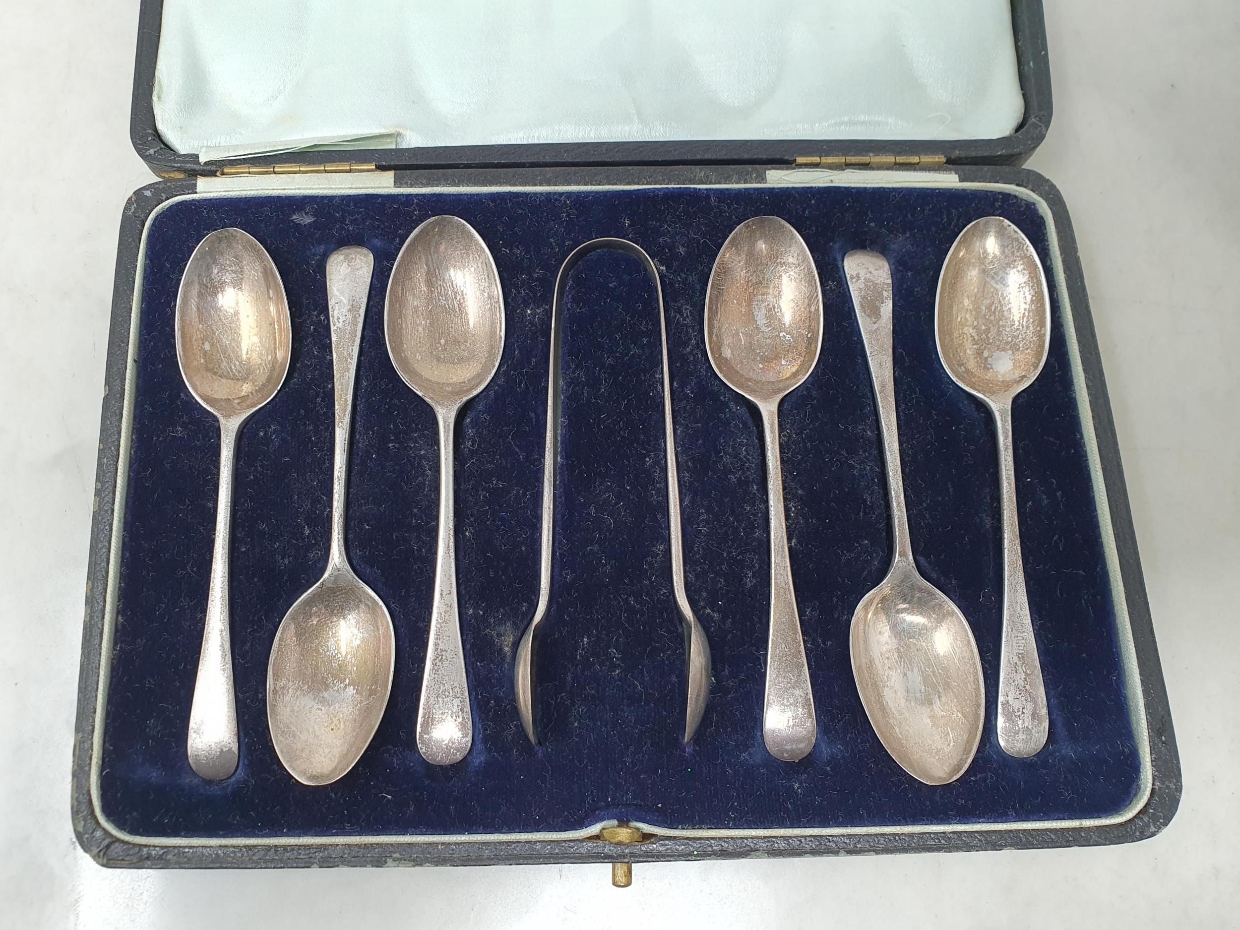 Six George V silver Teaspoons and Sugar Tongs, old english pattern ...