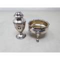 A George III silver urn shape Pepperette with bright cut engraving ...