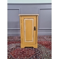 An orange and cream painted Pot Cupboard, (R6).