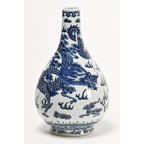 A Chinese blue and white vase, decorated with a five toed dragon, with ...