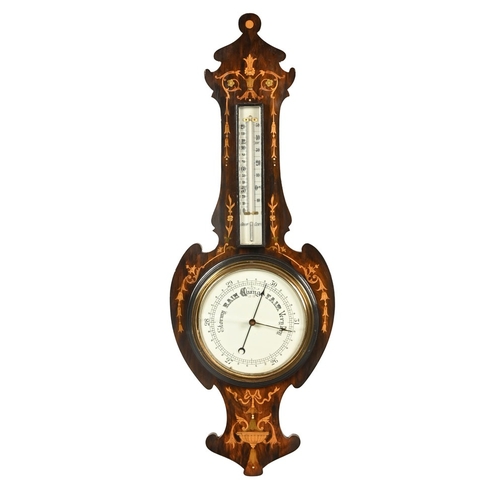 An Edwardian inlaid mahogany aneroid barometer, with ceramic dial and ...
