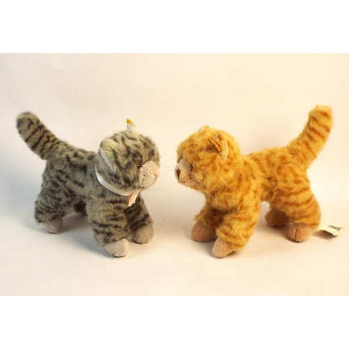 Two Steiff Cats , 099595 and 099571 with tags and button to ears.