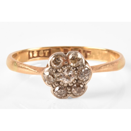 An 18ct yellow gold and platinum diamond coronet cluster, set with ...