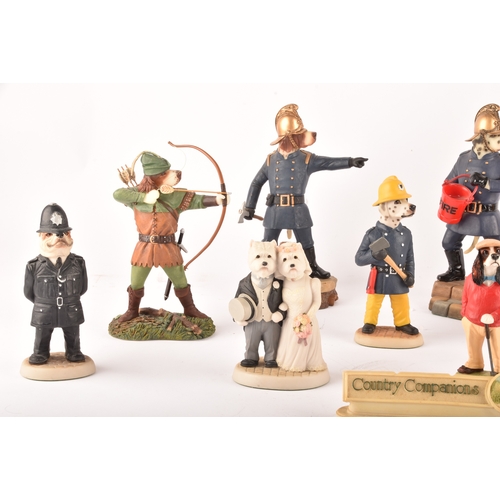 A collection of Robert Harrop dog figures to include, PG016 Geoff Tipps ...
