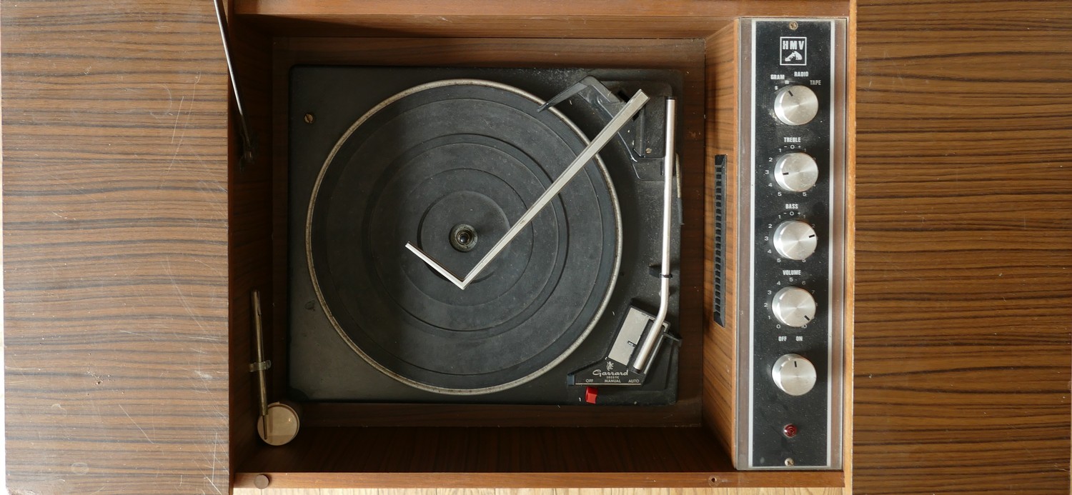 A HMV with integrated Garrard deck, model number 2025TC, cabinet record ...