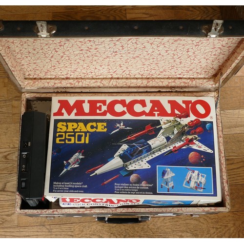 A suitcase and contents to include, Meccano sets 'Combat' & 'Space 250i ...