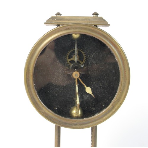 A 1920s gravity powered desk clock, by Kee-Less Clock Company, glass ...