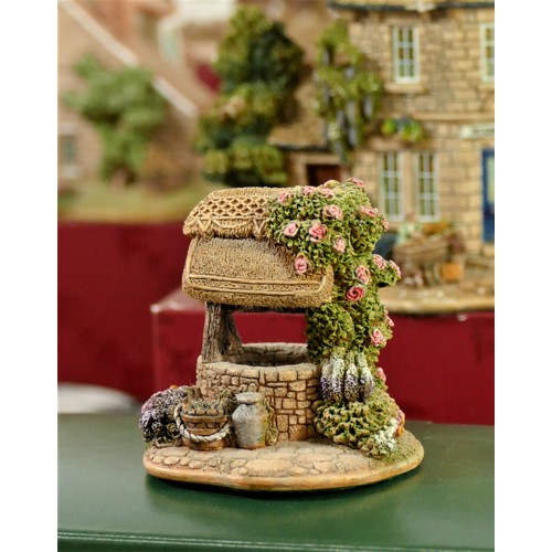 A collection of forty Lilliput Lane model cottages, together with ...