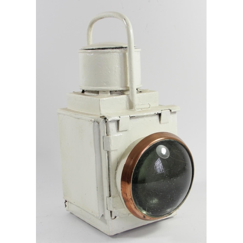 A locomotive headlamp, L.M.S style with brass bezel, no burner.