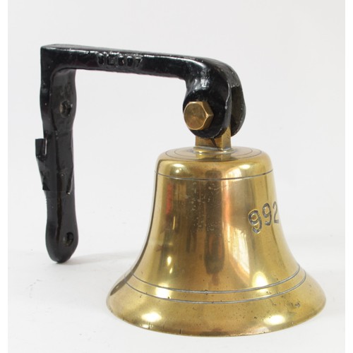A brass ships bell with clanger and knotted grip, numbered 992, with ...