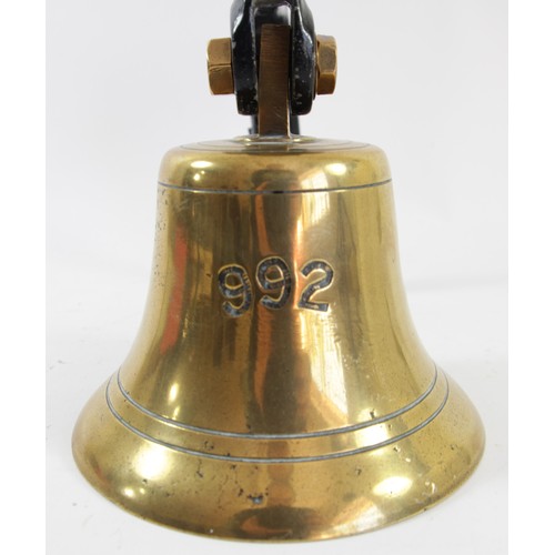 A brass ships bell with clanger and knotted grip, numbered 992, with ...