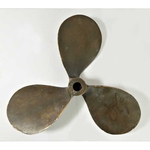 A brass three blade ship's propeller, diameter 17" pitch 17", stamped ...
