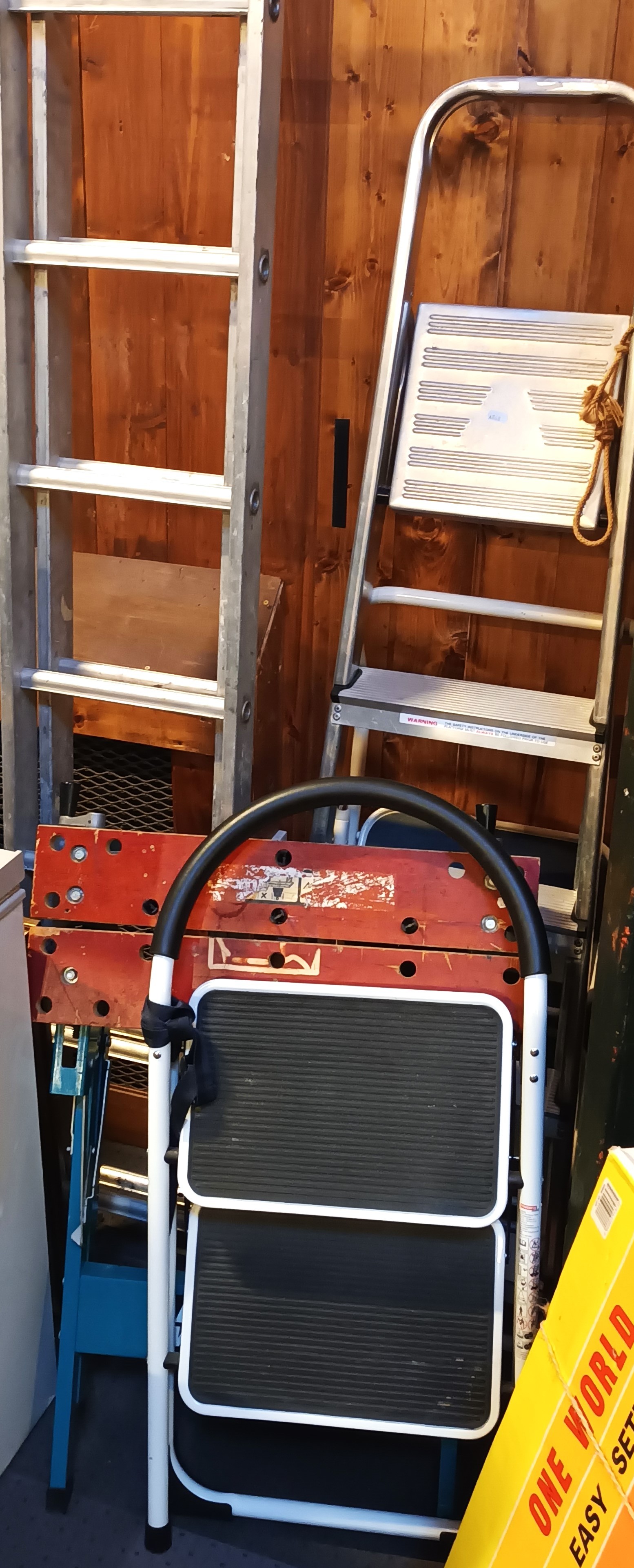 A Black & Decker Workmate 400, together with four step ladders (5).