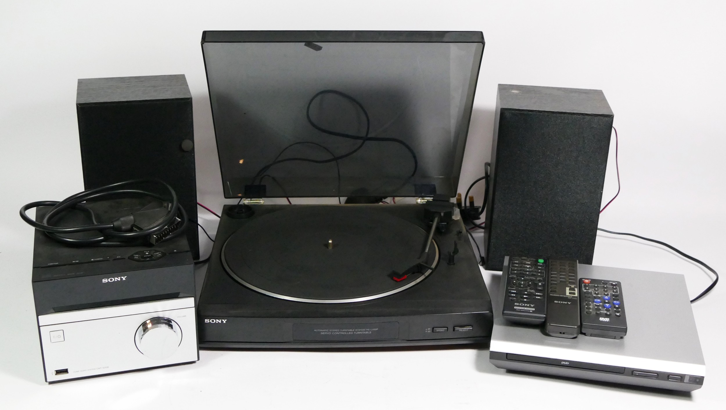 A Sony CMT-S20B home audio system including speakers, with remote ...