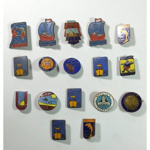 A collection of 17 Butlins metal and enamel badges, including Filey ...