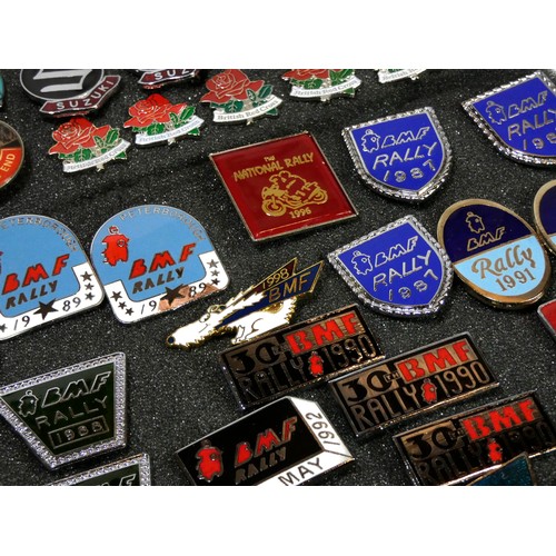 A collection of mainly motorcycle related enamel and metal lapel badges ...