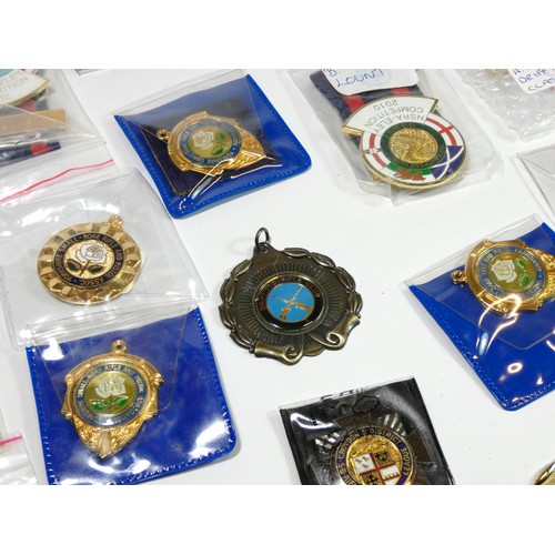 A collection of modern small bore rifle shooing badges from Driffield ...