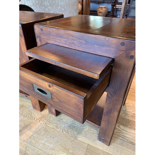 A pair of dark stained pine side tables, hidden pull out shelf over a ...