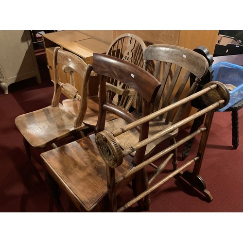 A stripped pine rocking chair, together with three dining chairs, a ...