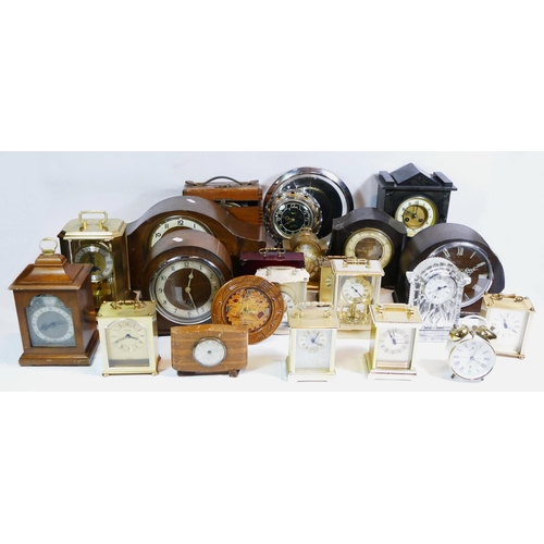 A collection of early 20th century and later clocks, to include ...