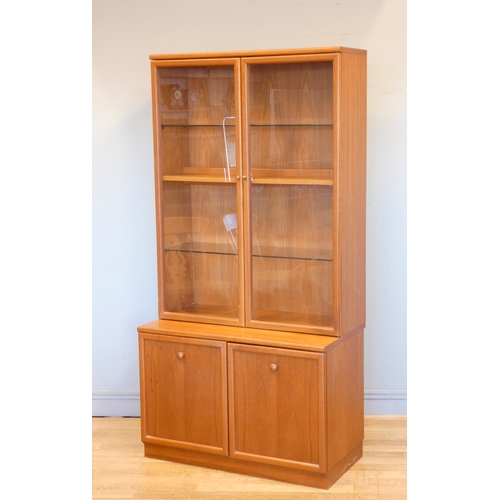 A G-Plan display cabinet, E.Gomme, three shelved upper with glazed ...