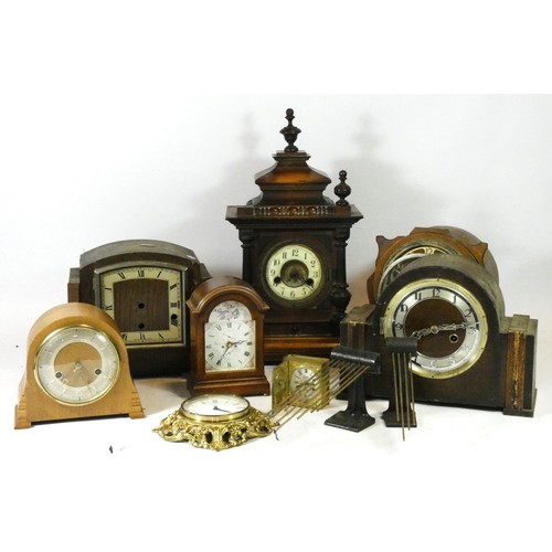 A collection of early 20th century and later mantel clocks, having ...
