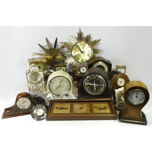 A collection of early 20th century and later mantel clocks, having ...