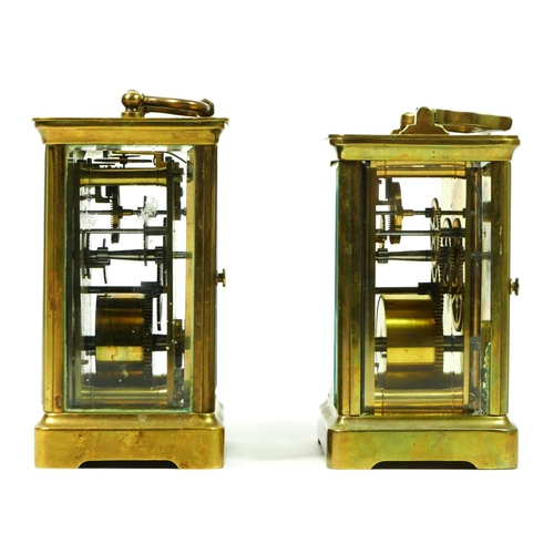 Two mid 20th century carriage clocks, having white enameled dials and ...