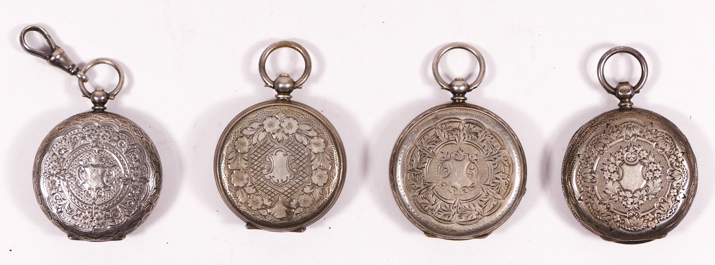 Three Swiss silver fob watches and a Victorian silver example ...