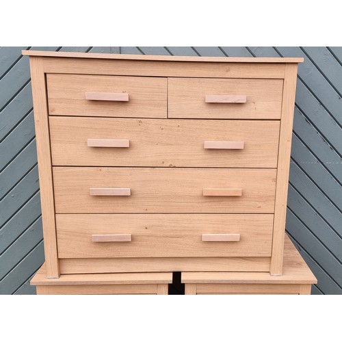 A pair of modern light teak effect three height bedside drawers, H67 ...