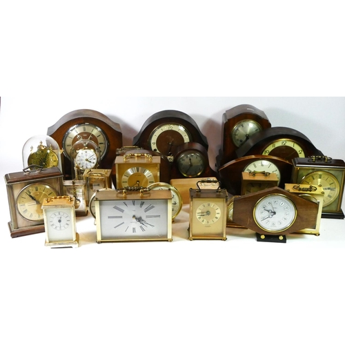 A collection of early 20th century and later mantel clocks, having ...