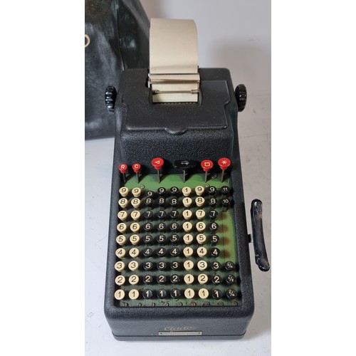 An Addo mechanical calculator, by Agrell Machine Co, with dust cover ...