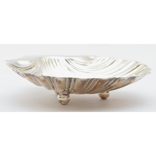 A Victorian silver shell shape dish, London, date letter worn, 14 x ...