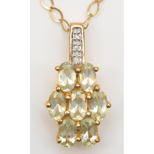 A 9ct gold diamond and yellow gemstone cluster pendant, chain, 2.7gm