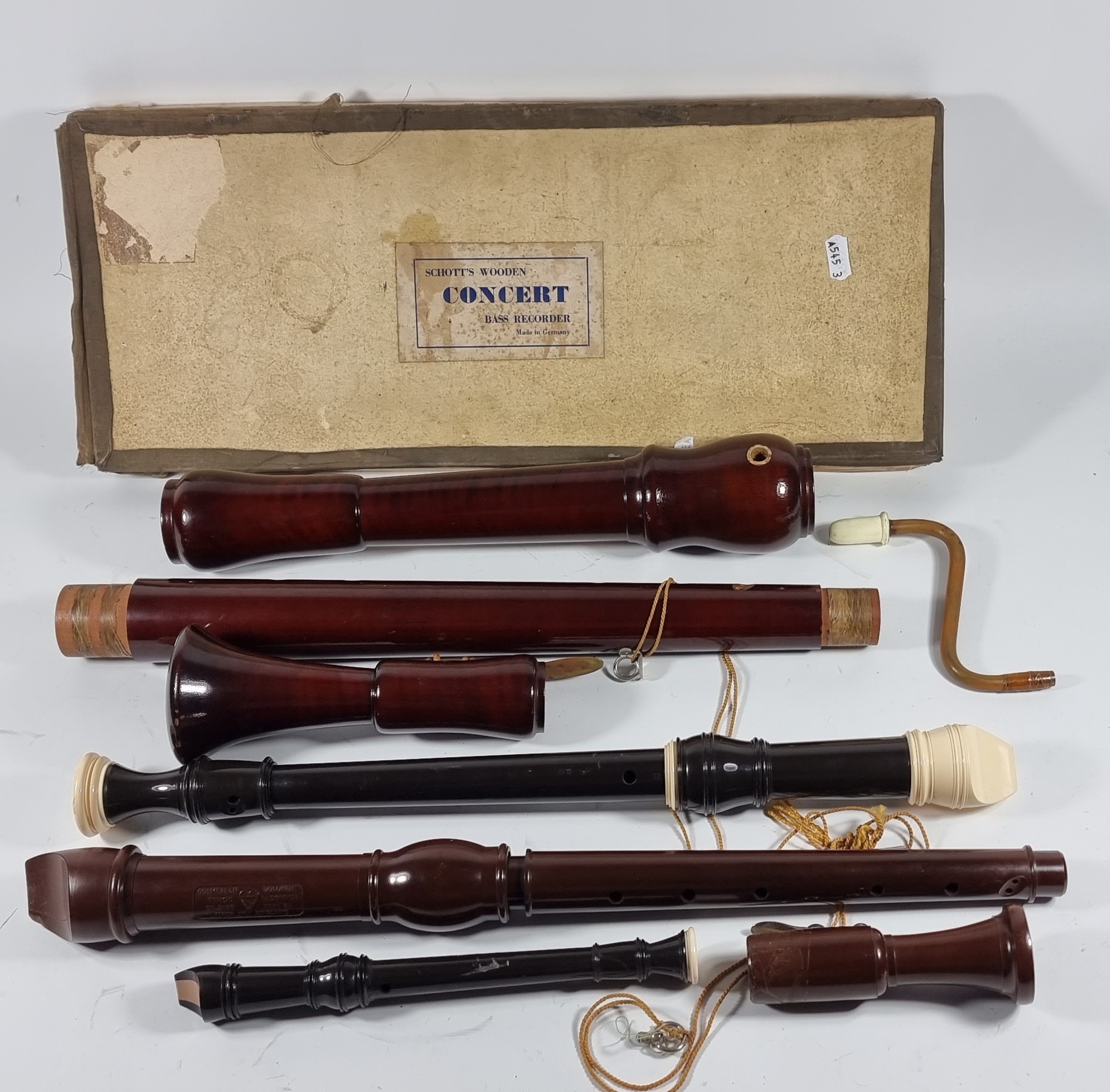 A Schott's wooden concert bass recorder together with a Dolonte tenor ...