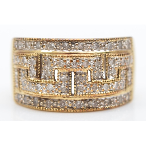 A 9ct gold and diamond Greek Key pattern diamond set ring, N, 5.5gm