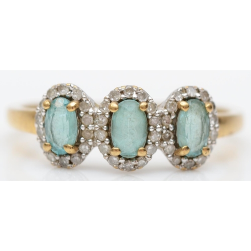 A 9ct gold blue stone and diamond triple cluster ring, R, 2.3gm