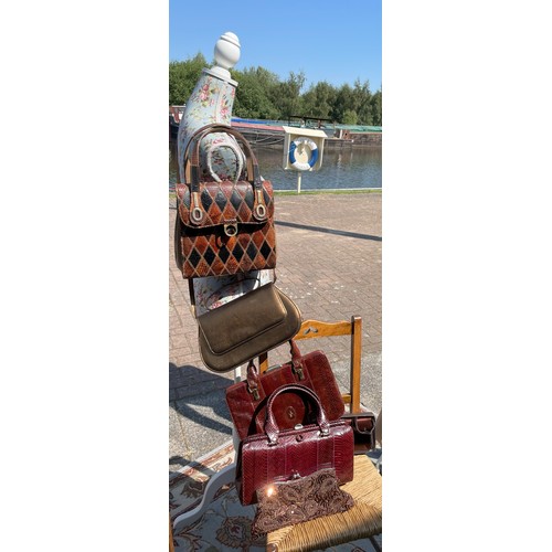 A collection of vintage and retro, handbags to include skin and skin ...