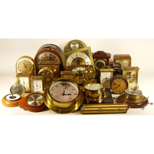 A collection of quartz and mechanical clocks, to include an Ingersoll ...