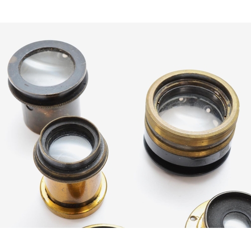 A collection of six brass lenses, to Beck Symmetrical and others ...