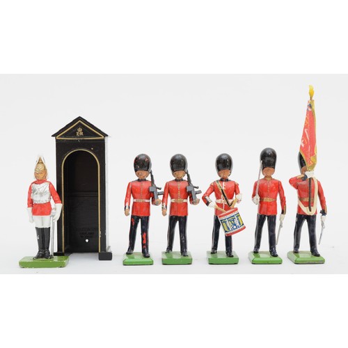 A collection of six Britain's painted lead figures, Queens Guards, 10cm ...
