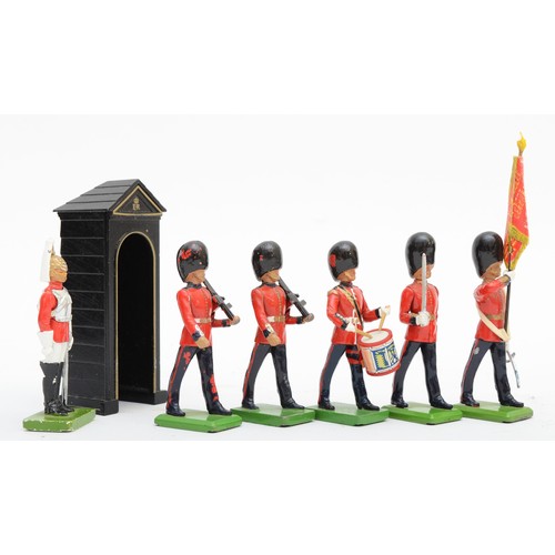 A collection of six Britain's painted lead figures, Queens Guards, 10cm ...