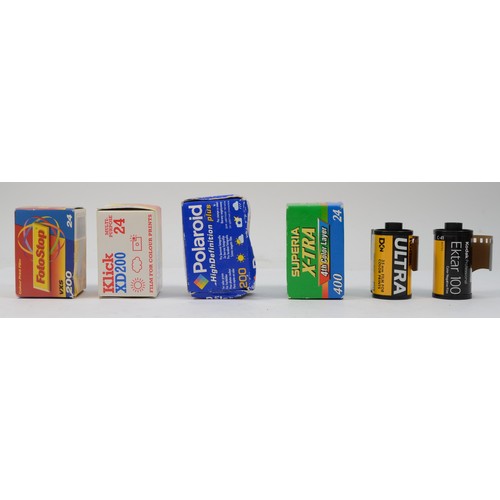 Six rolls of 35mm film, expired, including four rolls of 24 exposure ...