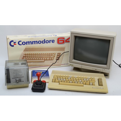 A boxed vintage Commodore 64, Commodore 64 1541-II, Commodore MPS 1000, A Philips CM 8524 monitor, a